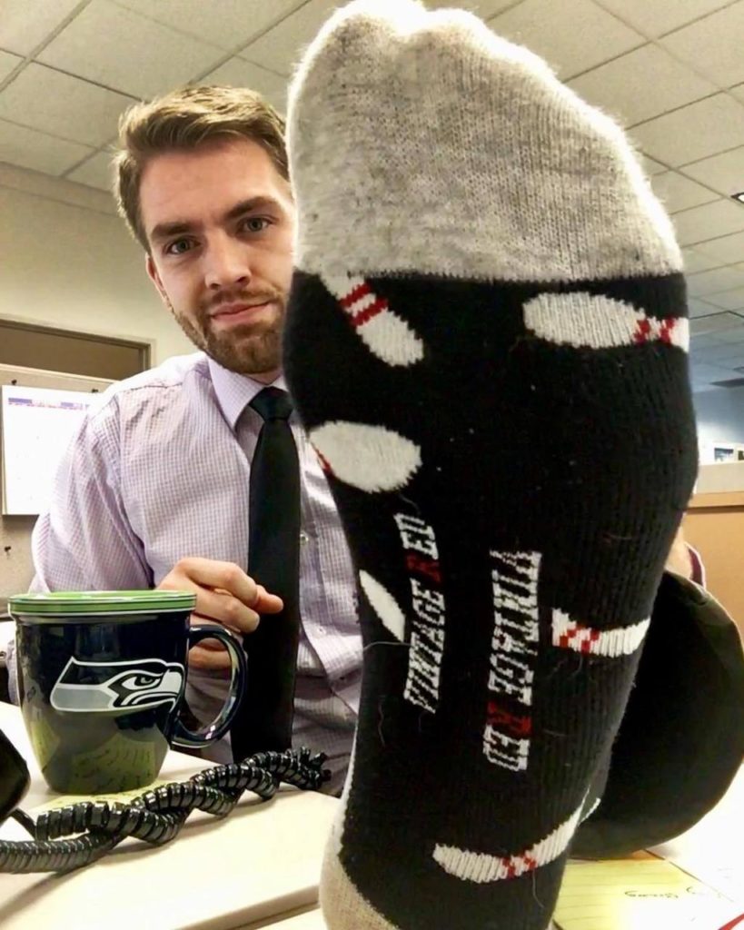 Jasonmasters54’s business socks in the office - Male Feet Blog
