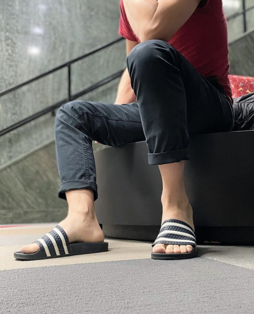 Bro_code_33 barefoot in slides in the lobby - Male Feet Blog